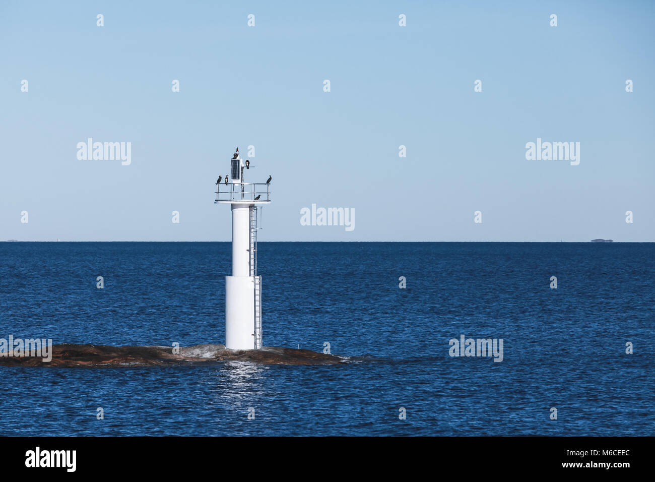 Standard white metal lighthouse tower, Norway Stock Photo - Alamy