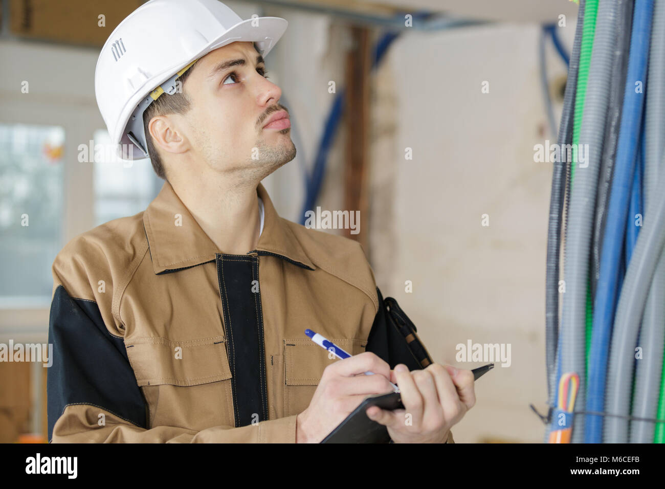 construction worker planning contructor checking concept Stock Photo ...
