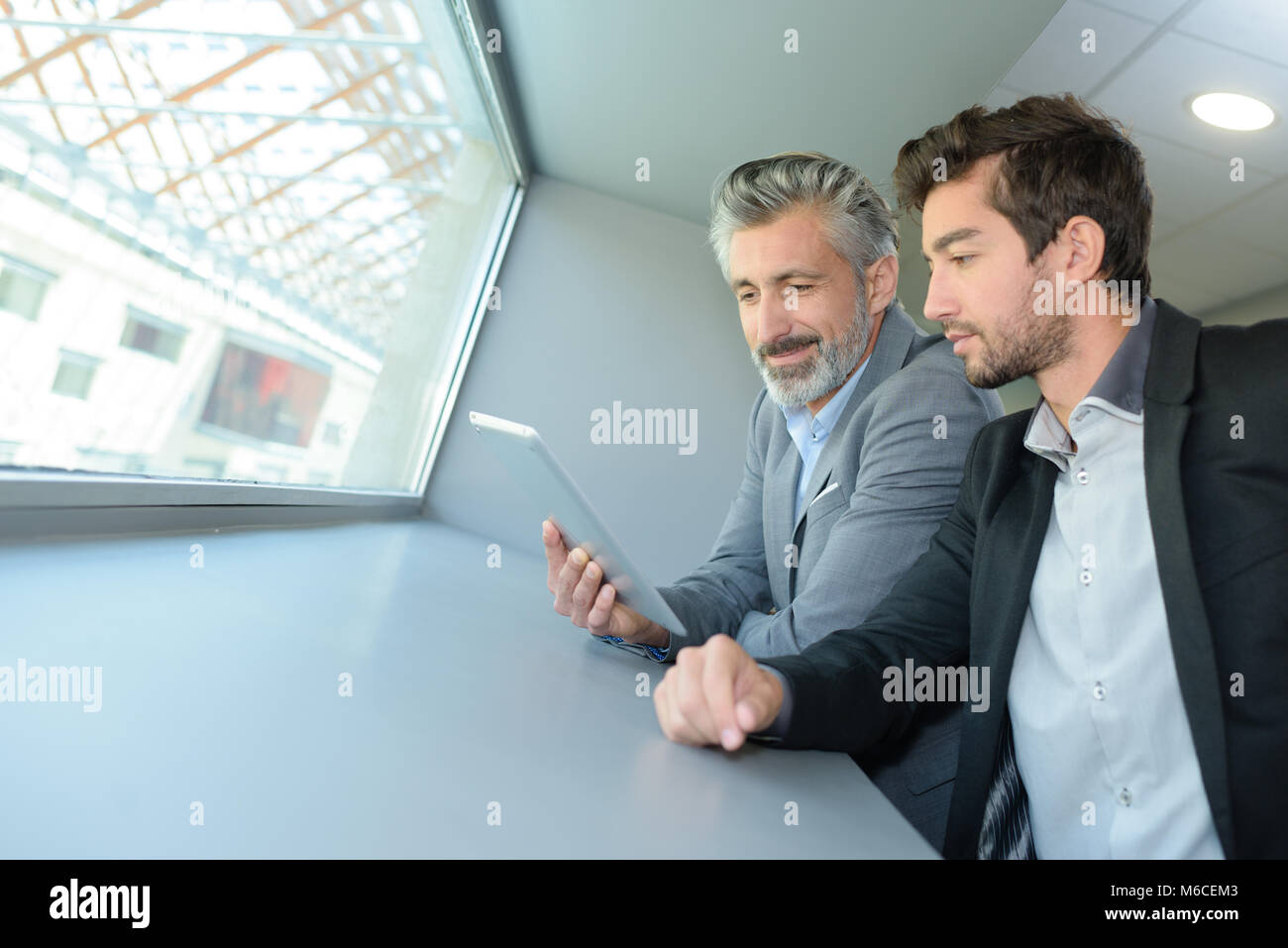the boss and the apprentice Stock Photo - Alamy