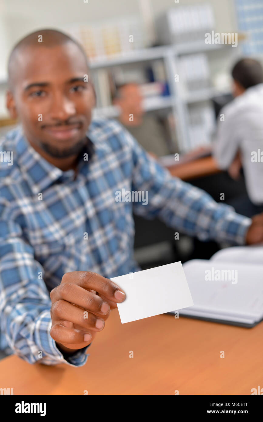 giving a business card Stock Photo - Alamy