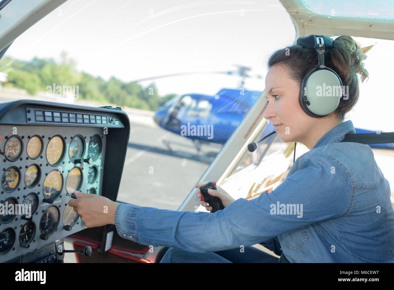 female pilot with map in airplane cockpit Stock Photo - Alamy