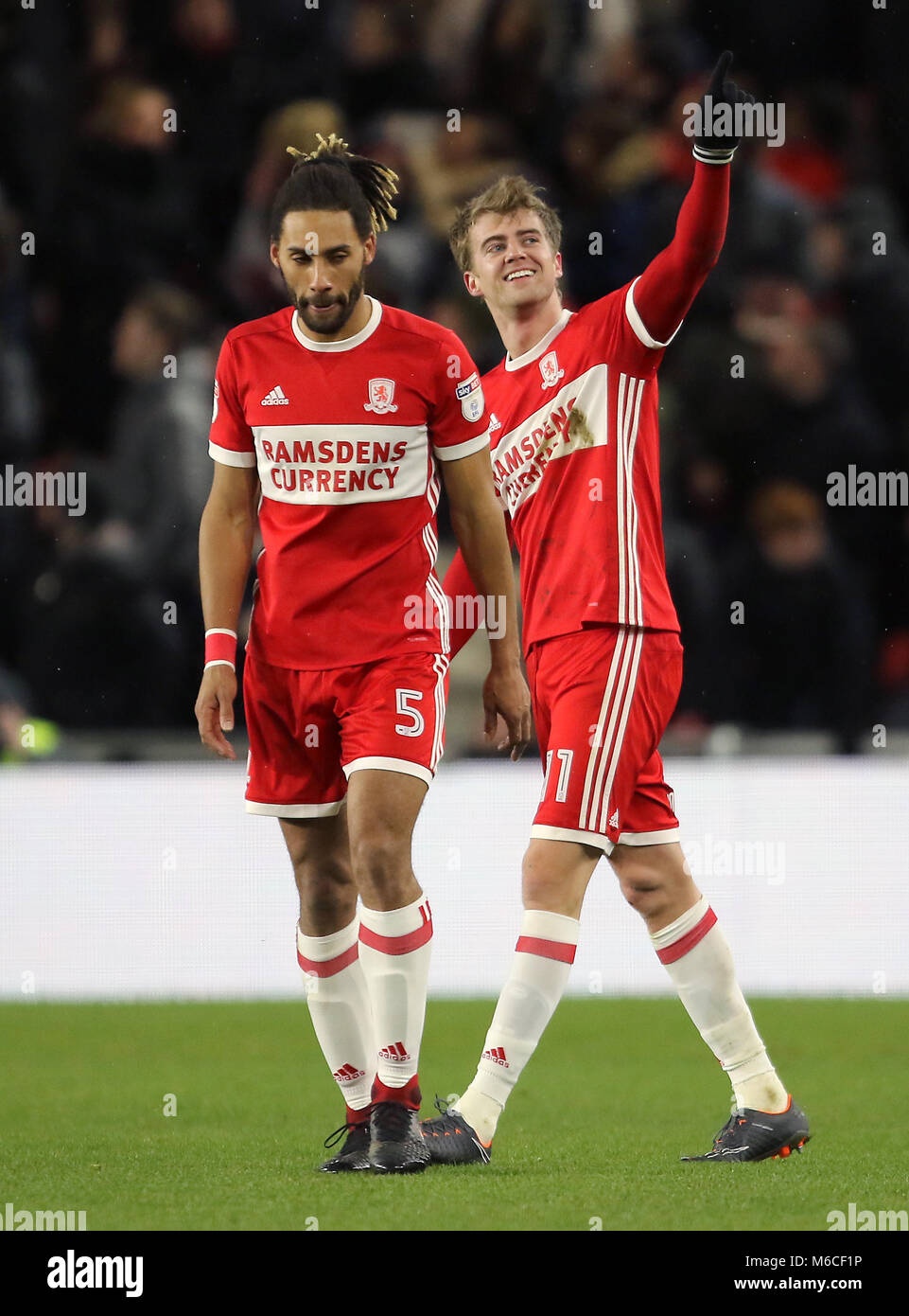 Middlesbrough's Patrick Bamford (right) looks up to the fans after ...
