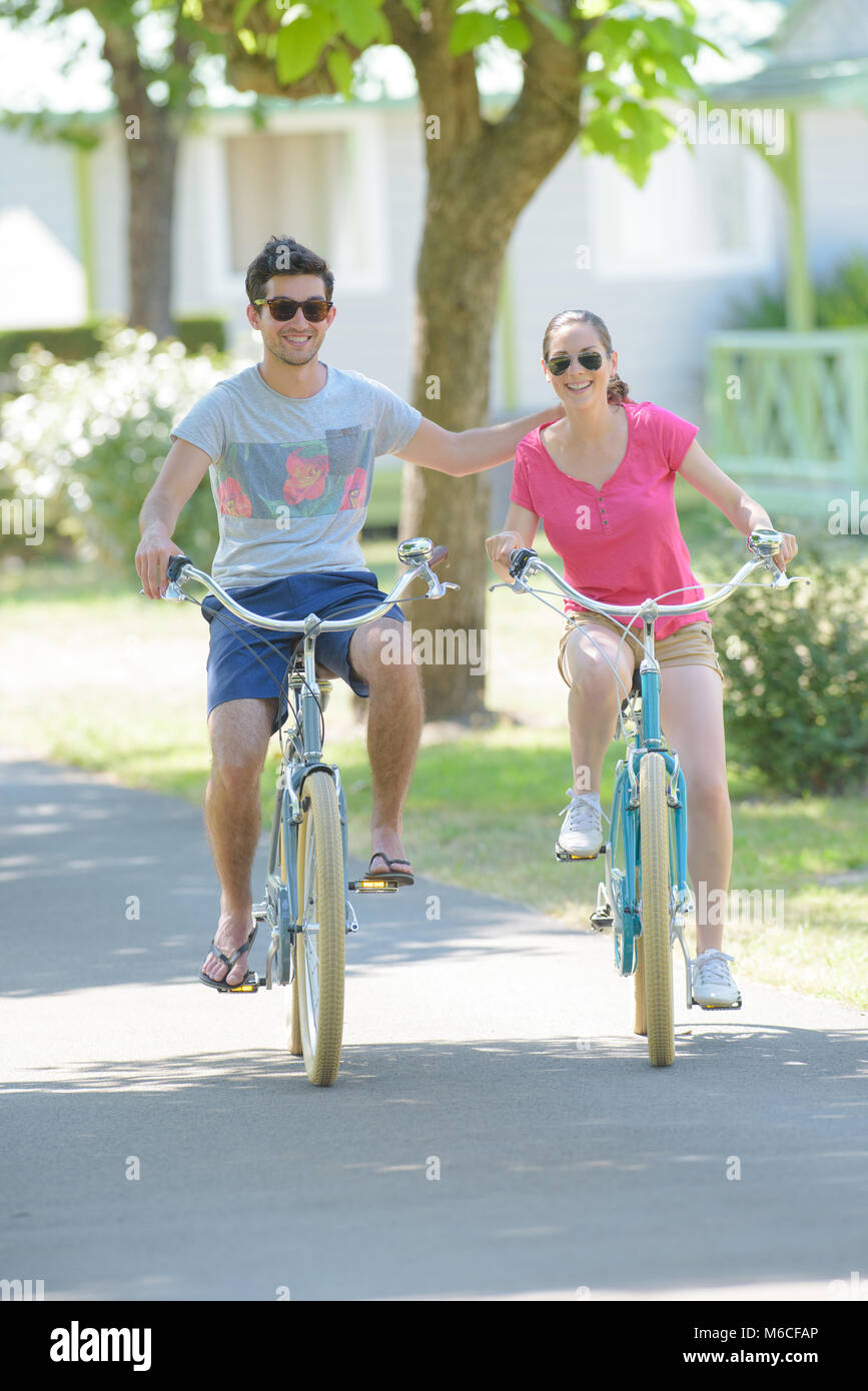 Couple on bicycles Stock Photo - Alamy