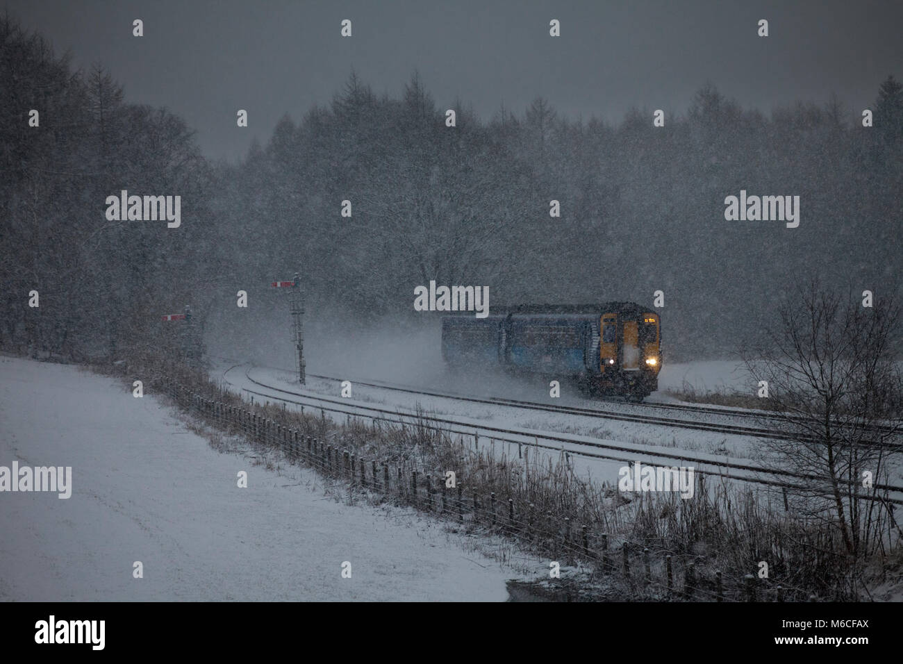 A Scotrail sprinter train passes Thornhill (North of Dumfries) in a ...