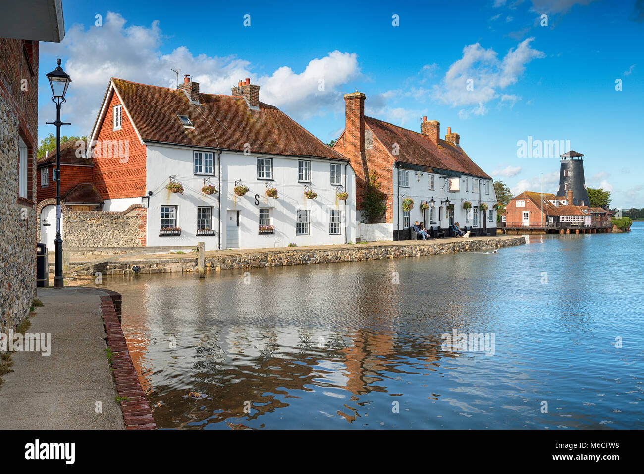 Pretty cottages and an old mill at Langstone Quay near Havant in ...