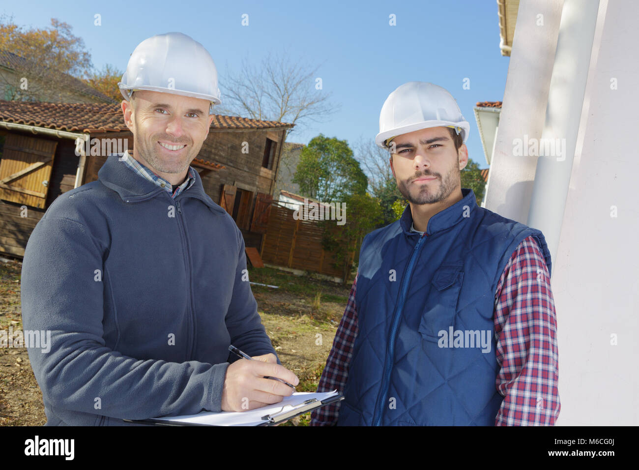 construction worker and planning contractor developer Stock Photo - Alamy