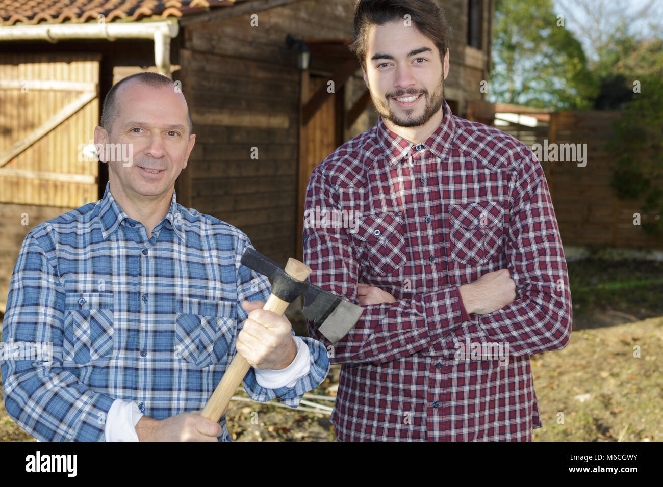men posing with ax Stock Photo - Alamy