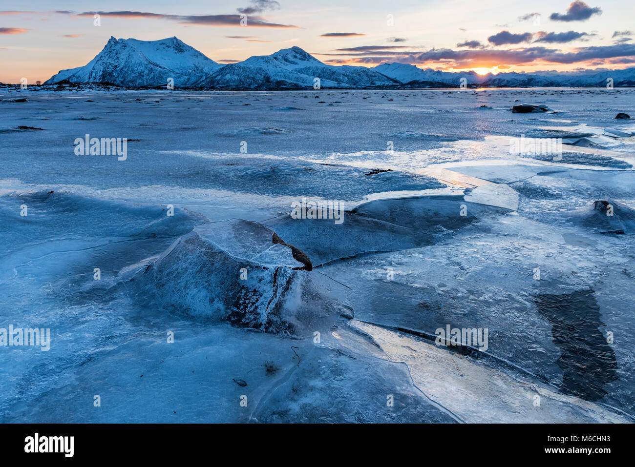 Icy coast on dusk, Gimsoy, Lofoten, Norway Stock Photo - Alamy