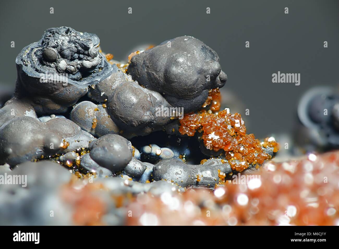 Orange crystals of vanadinite on a botryoidal goethite matrix from ...