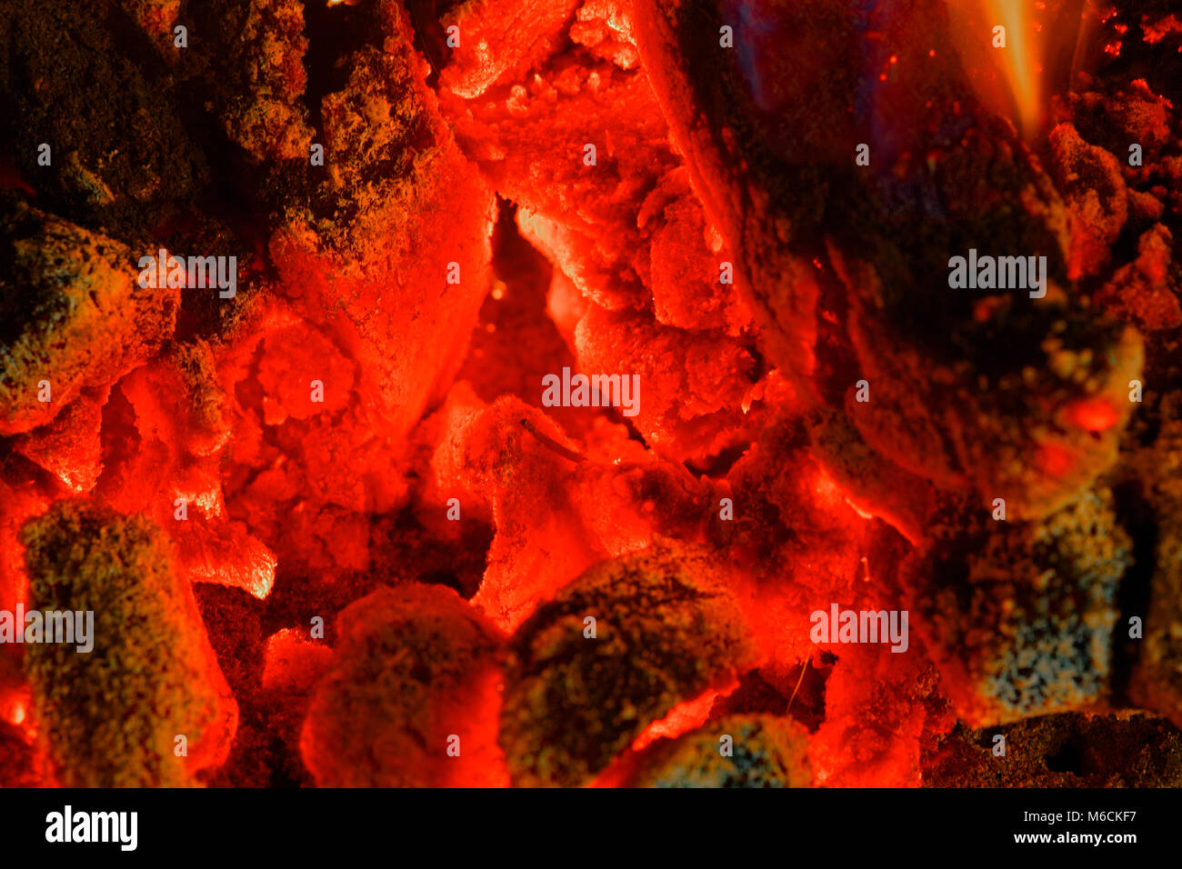 Close-up of a red heat in a fireplace.Interesting background.Horizontal ...