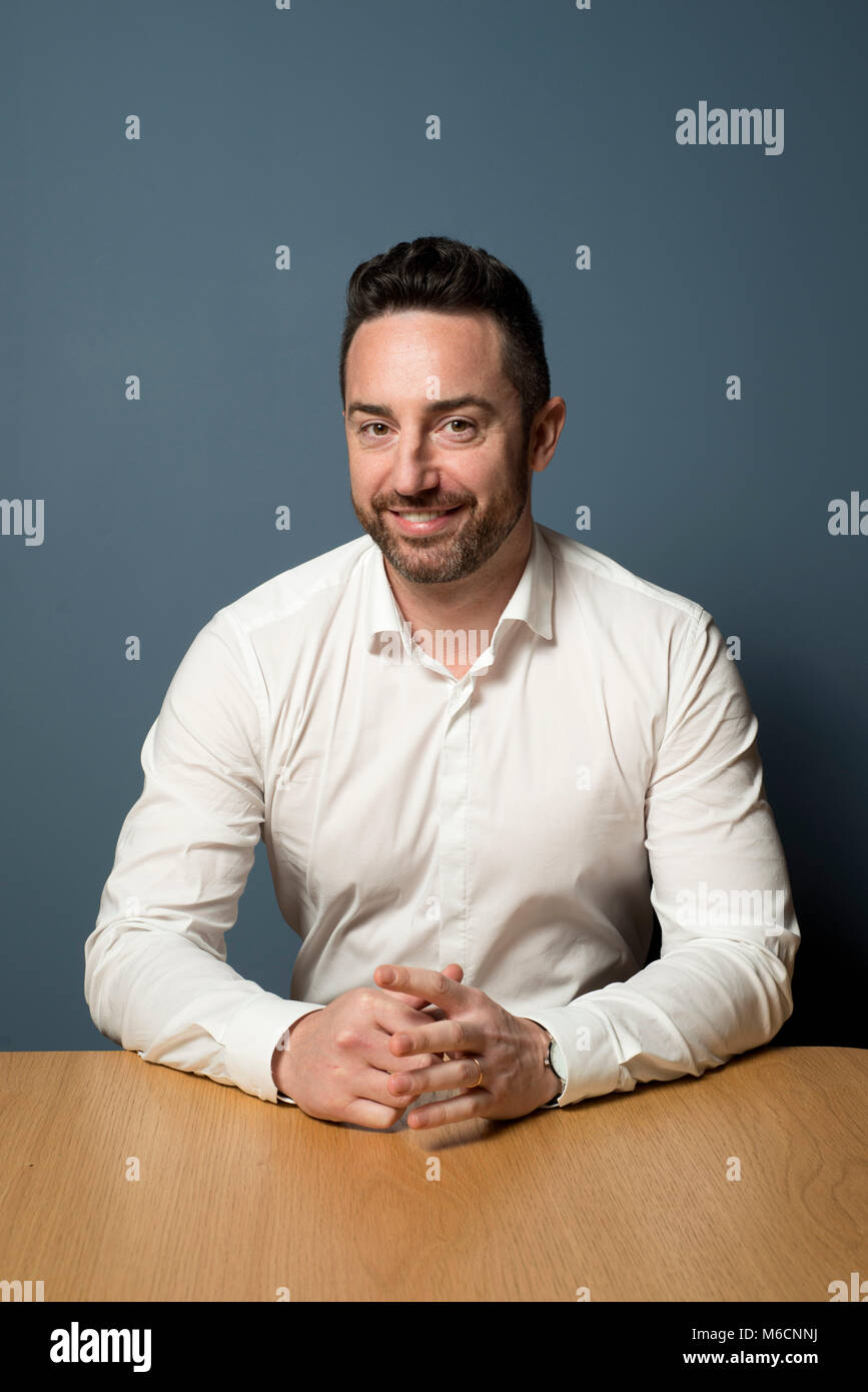 Man behind the desk hi-res stock photography and images - Alamy