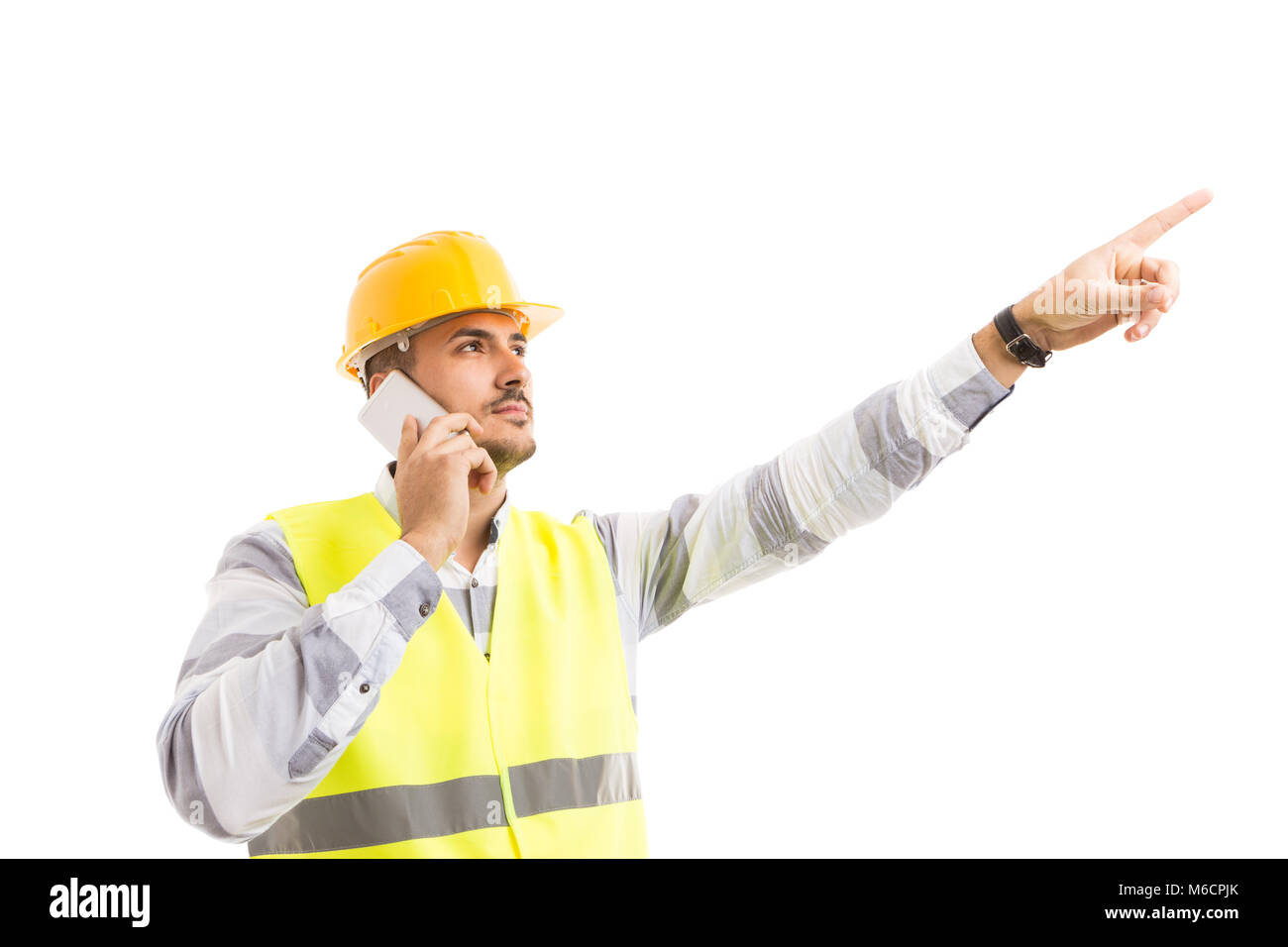 Visionary and successful architect or engineer talking on the phone and ...