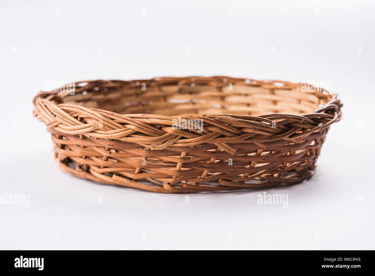 empty cane basket or tokri in hindi and topli in marathi, isolated over ...
