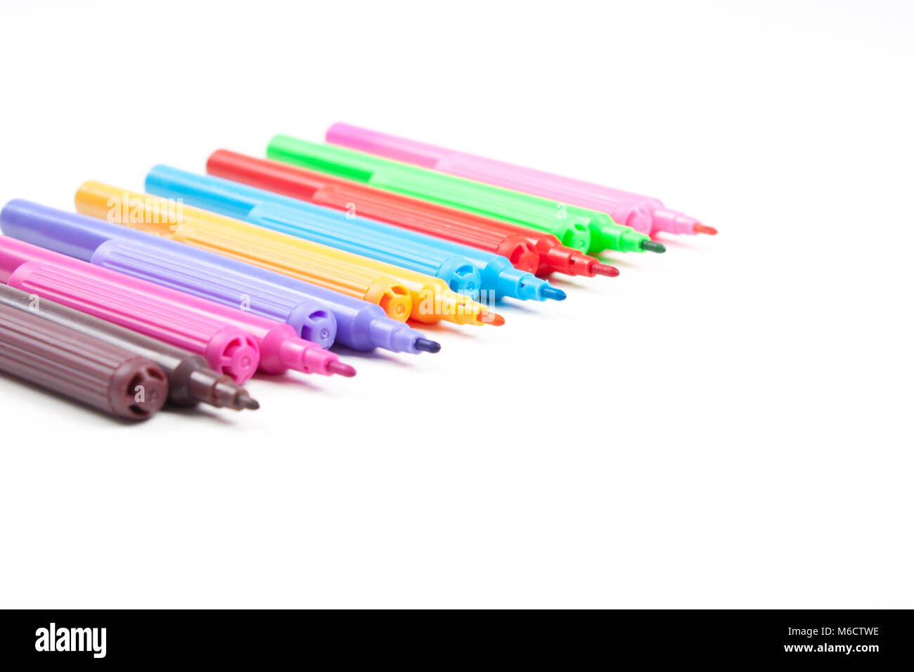 Colored markers isolated on white background Stock Photo - Alamy