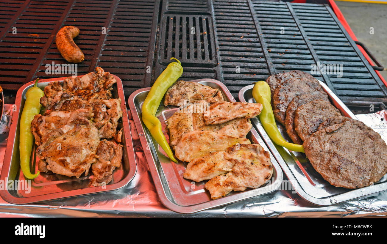 Freshly prepared and grilled meats roasted on offer to customers Stock ...