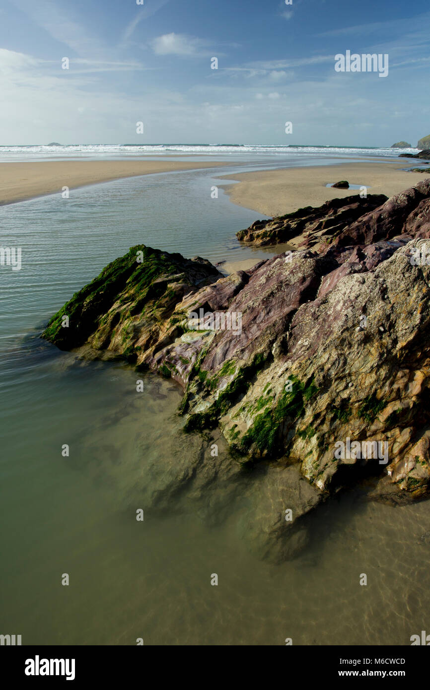 Sandy shore rockpool Stock Photo - Alamy