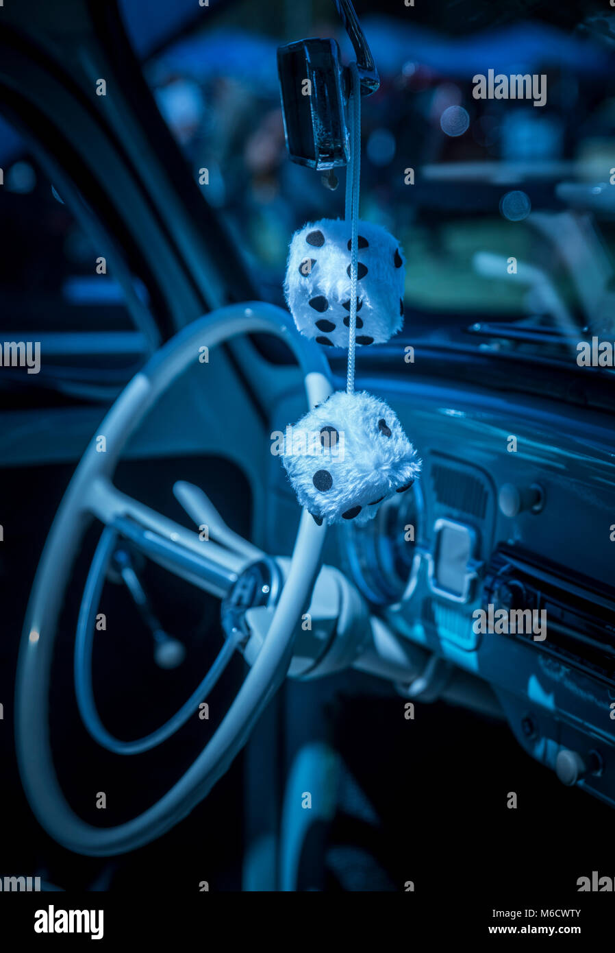 Furry Dice in Car Stock Photo - Alamy