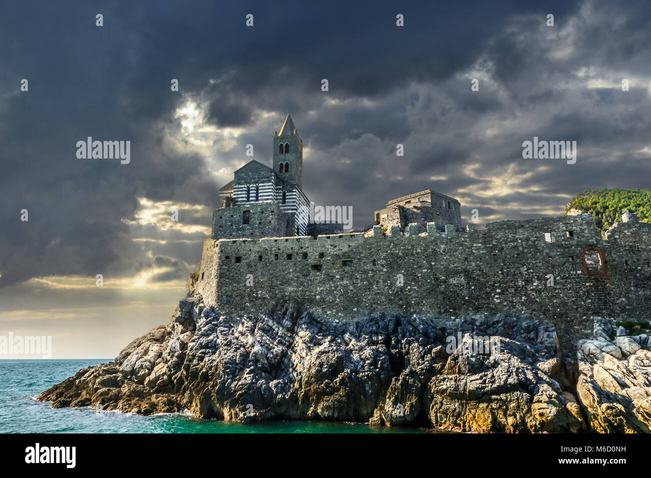 The imposing cliffside Church of St. Peter or San Pietro Church in the ...