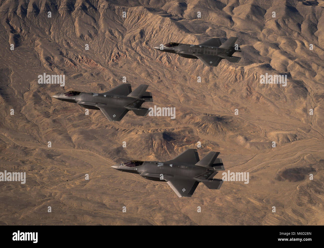 Three U.S. Air Force F-35A Lightning IIs, assigned to the 4th Fighter ...