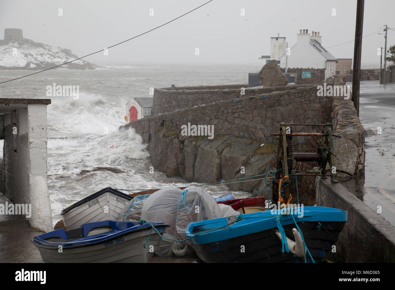 Dublin, Ireland. 2nd Mar, 2018. Sea surges over the pier at Coliemore ...