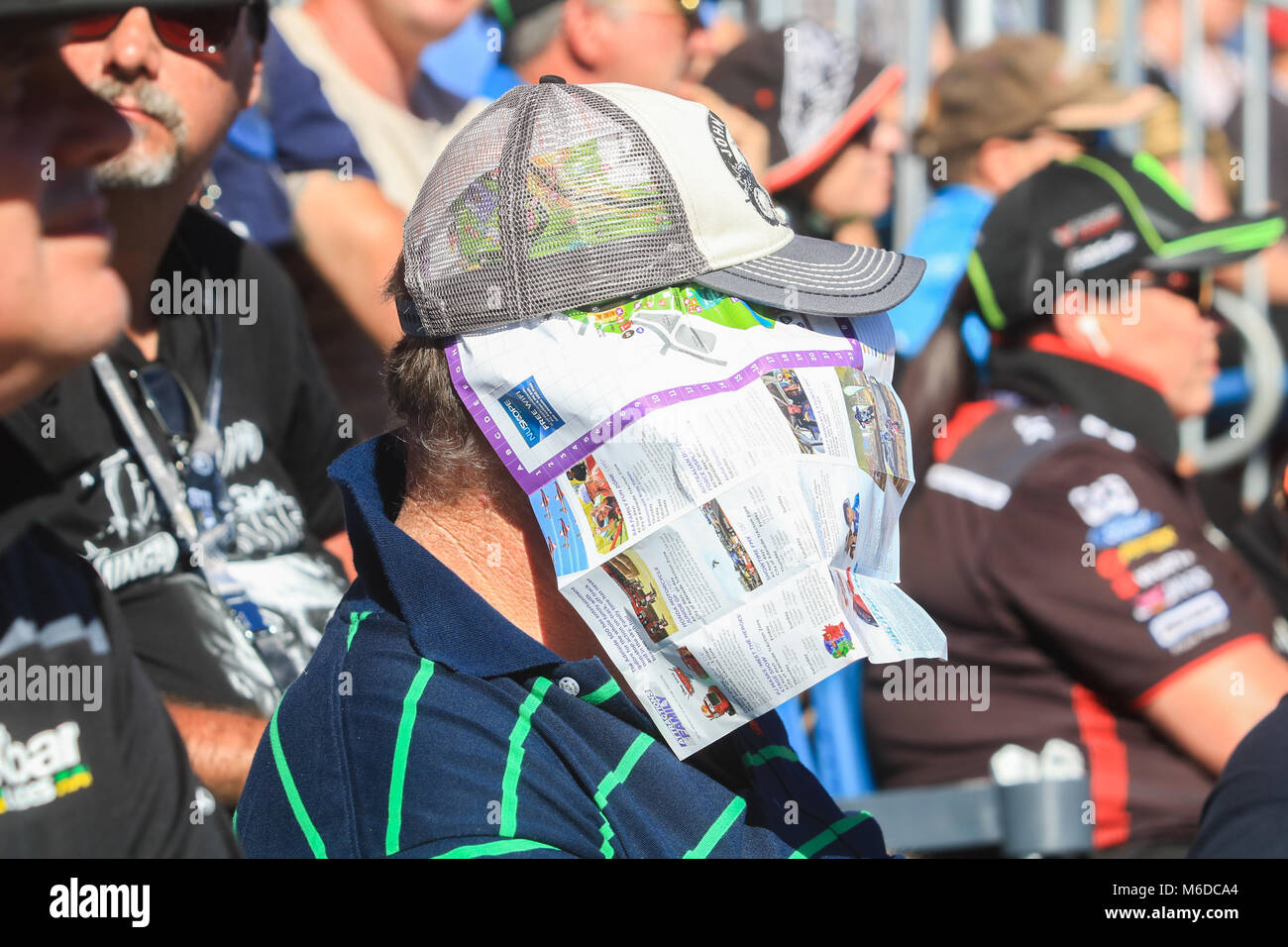 Adelaide Australia 3rd March 2018. A Motorsport fan soaks up the sun ...