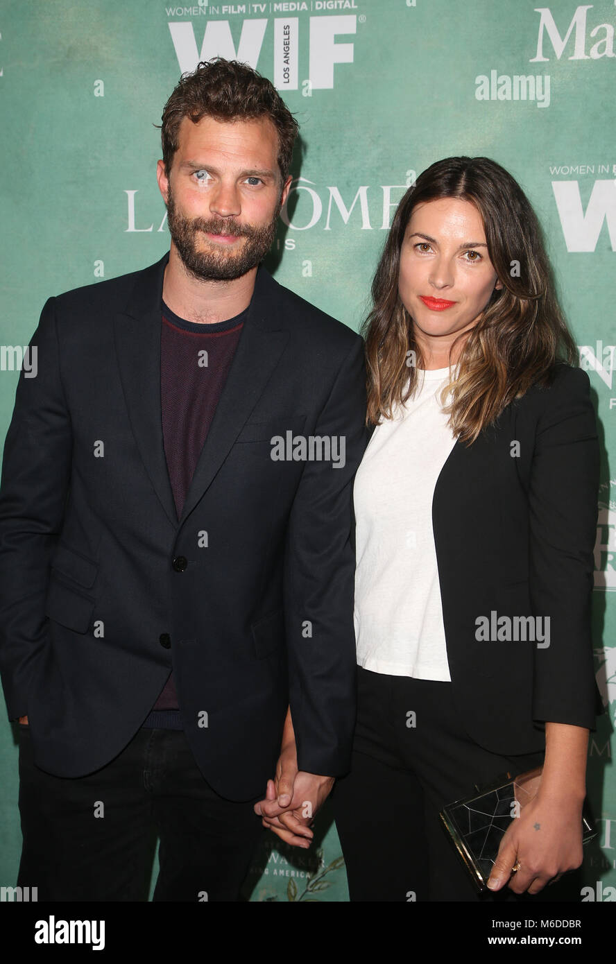 Beverly Hills, Ca. 2nd Mar, 2018. Jamie Dornan, Amelia Warner, at the ...