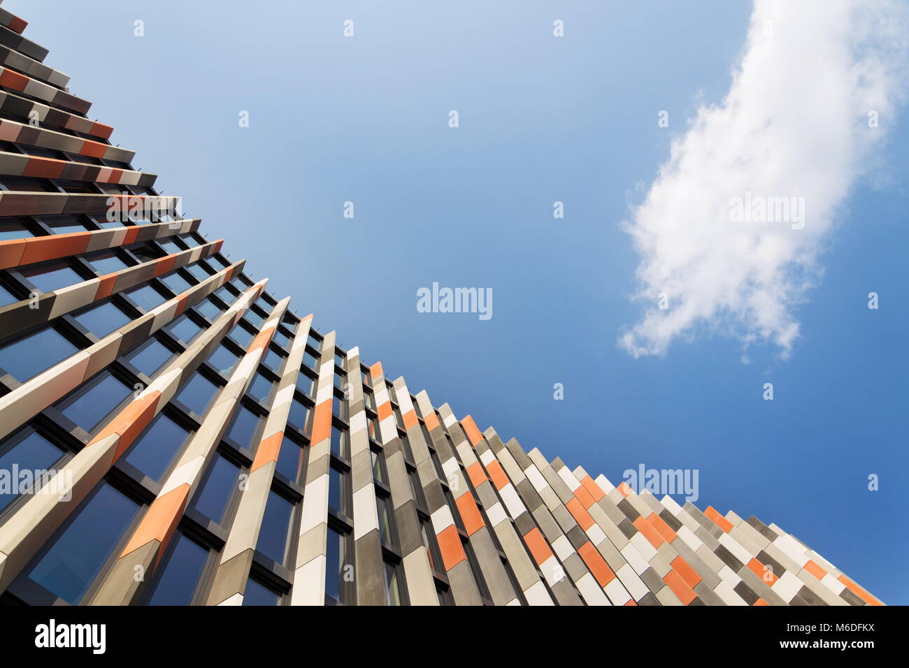Orange, grey and white brise soleil sun breakers office building Stock ...