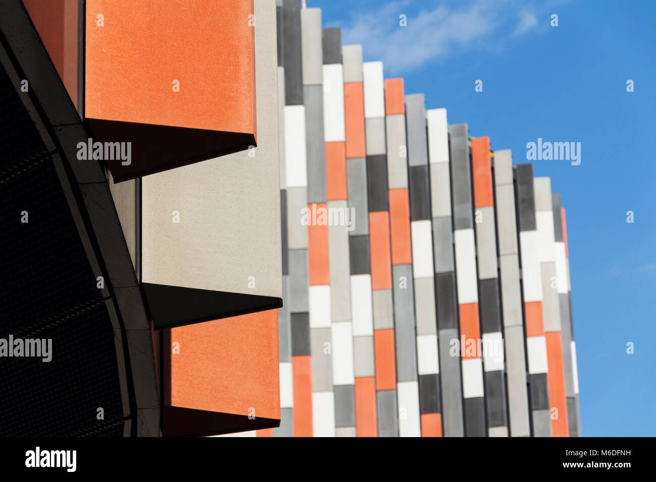 Orange, grey and white brise soleil sun breakers office building Stock ...