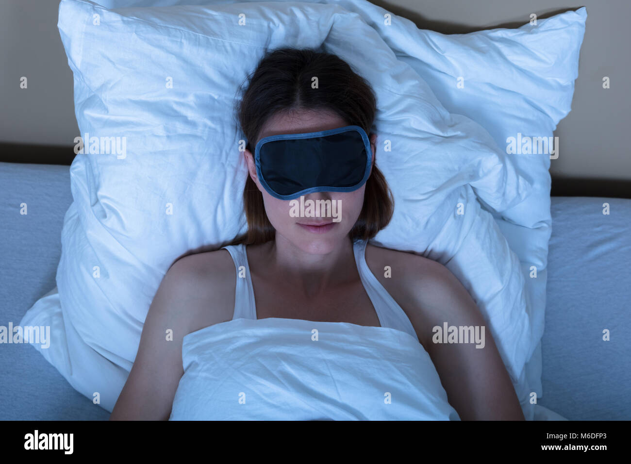 Close-up Of Beautiful Young Woman Sleeping In Bed With Eye Mask Stock ...