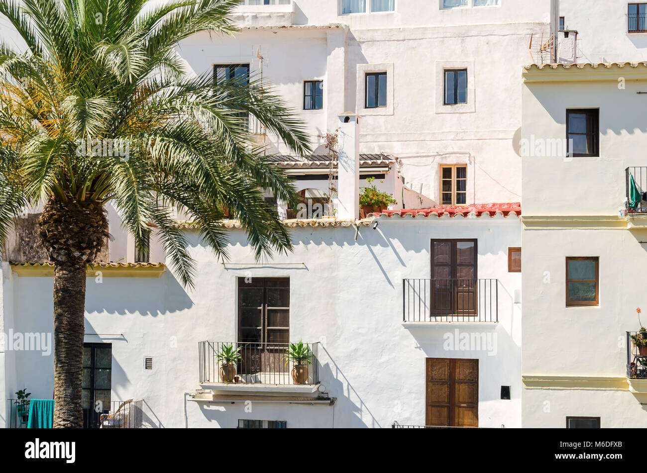 Ibiza, Spain - June 3, 2016: View of typical old buildings in the Dalt ...