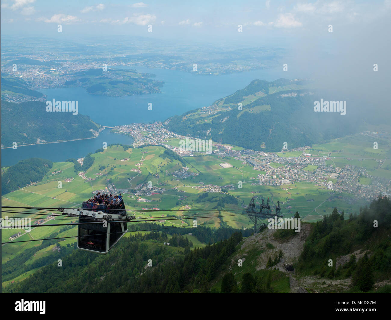 CabriO cable car to Stanserhorn with Lake Luzern in background Stock ...