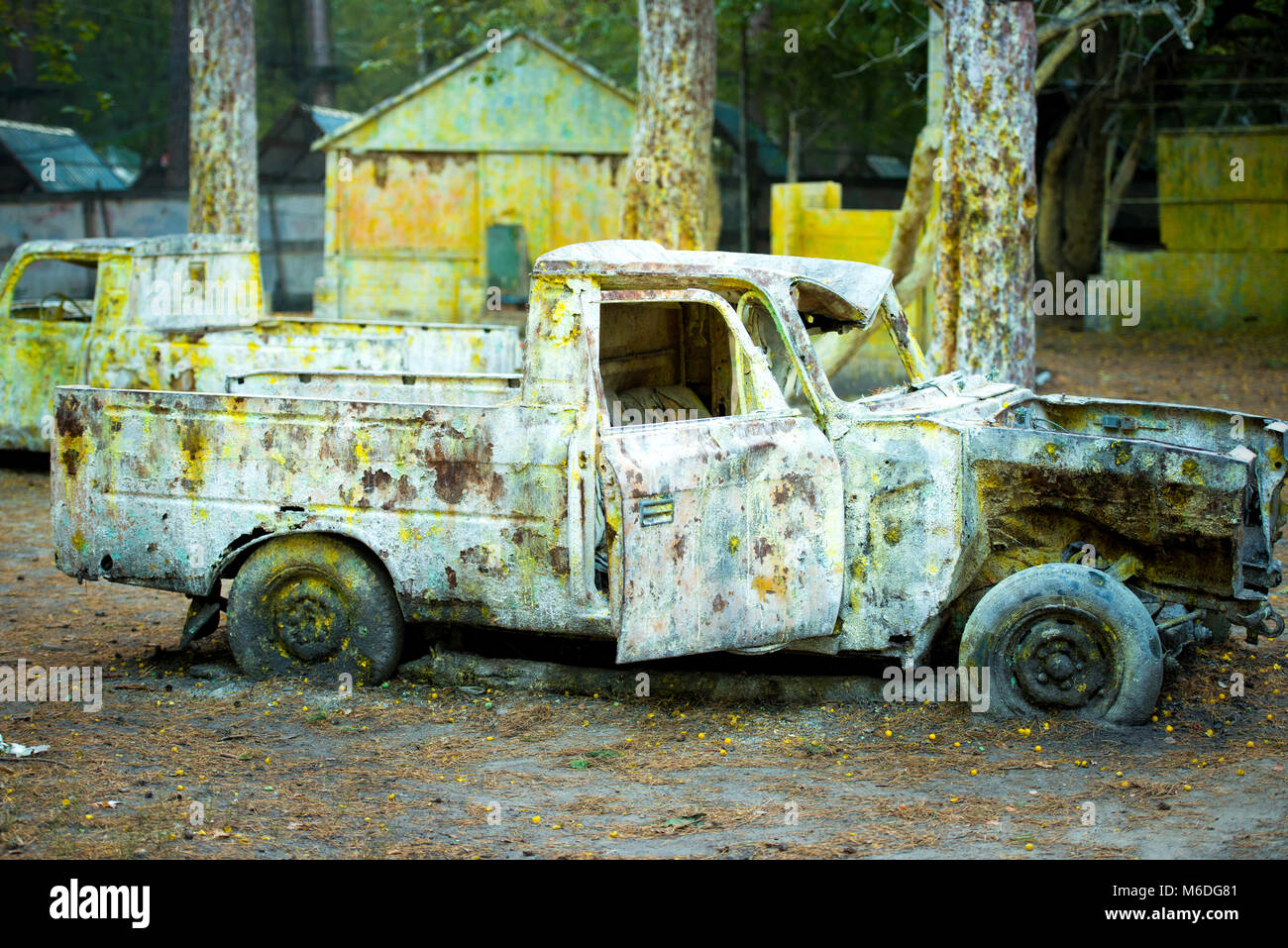 An old rusty car in paint from paintball Stock Photo - Alamy