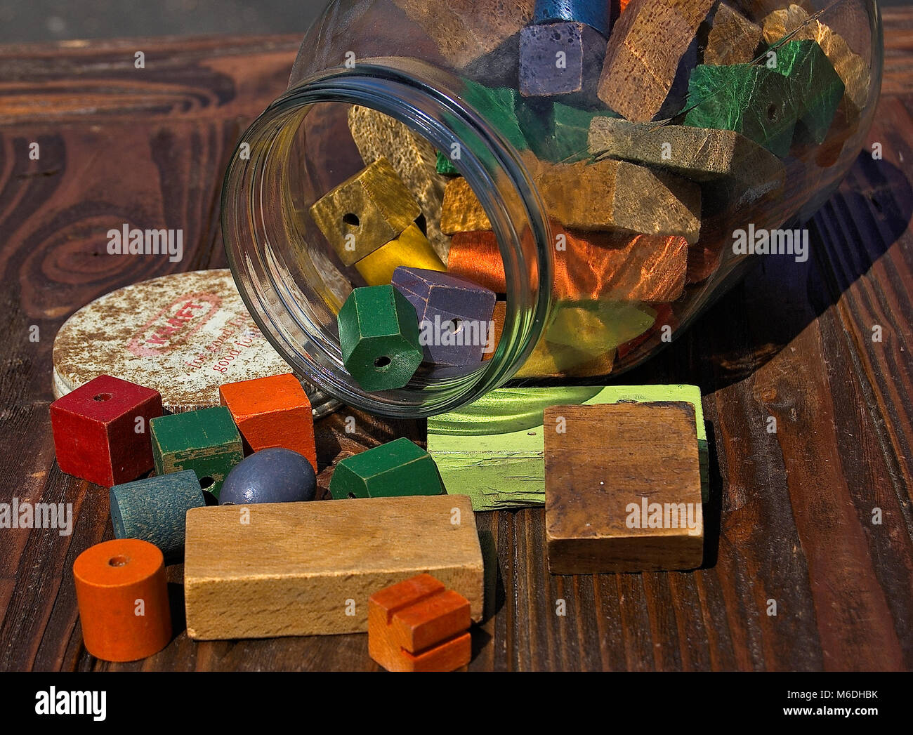 Old wooden children's toys in a glass jar Stock Photo - Alamy