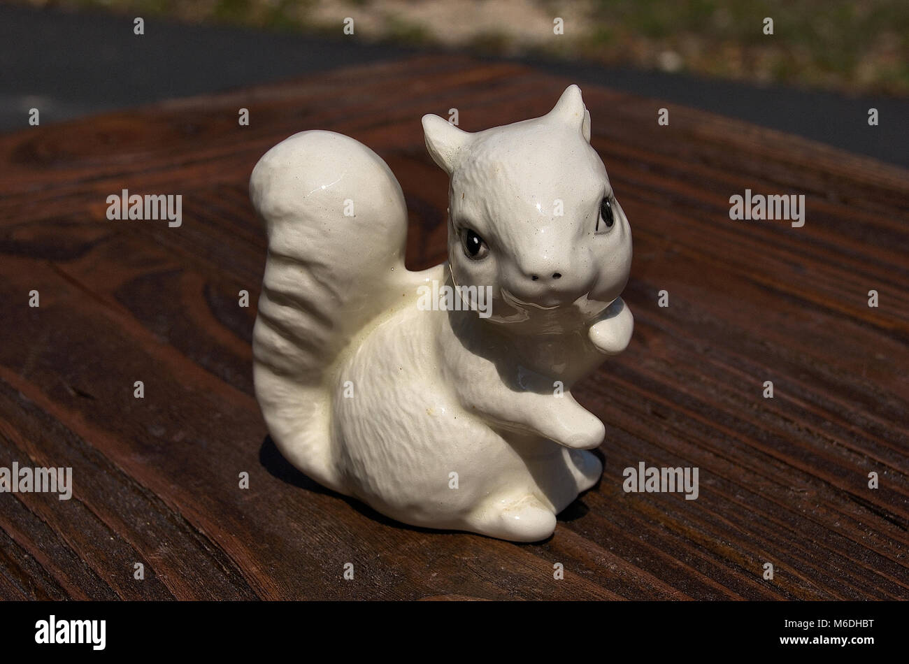 White ceramic squirrel Stock Photo - Alamy