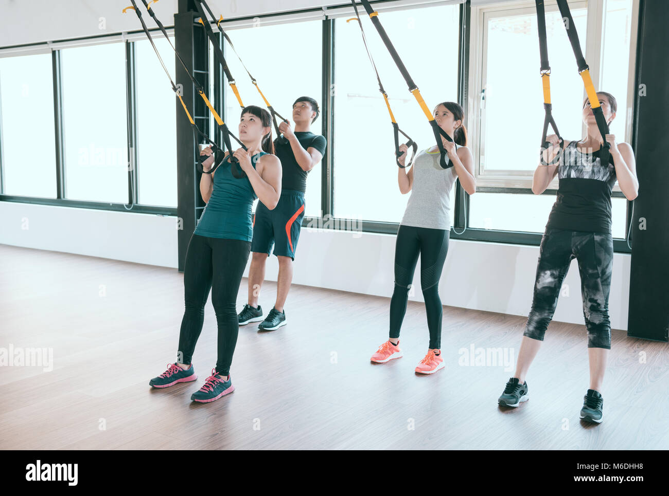 professional expert TRX total body resistance exercises trainer ...