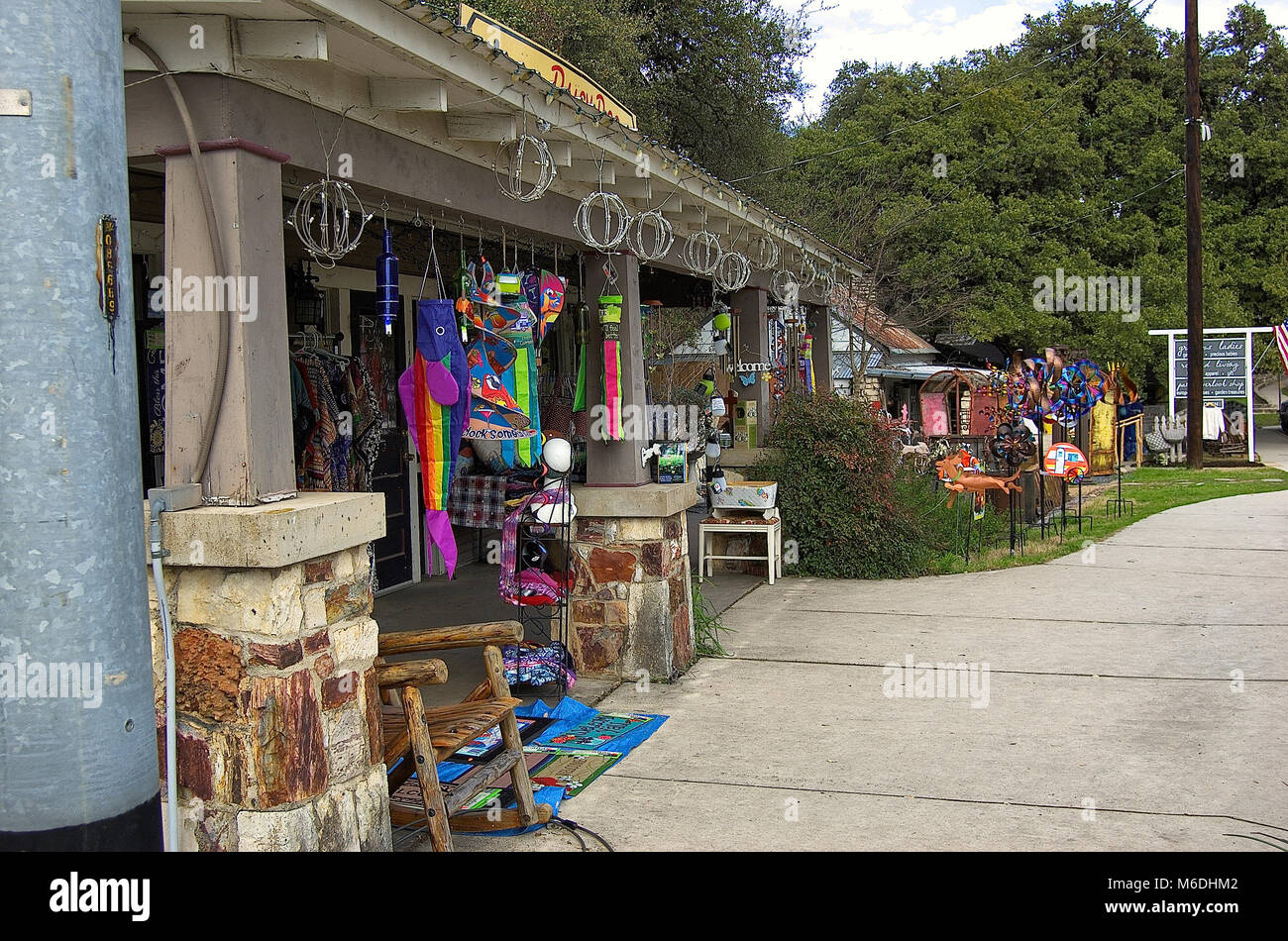 Store front with items displayed on the sidewalk Stock Photo - Alamy