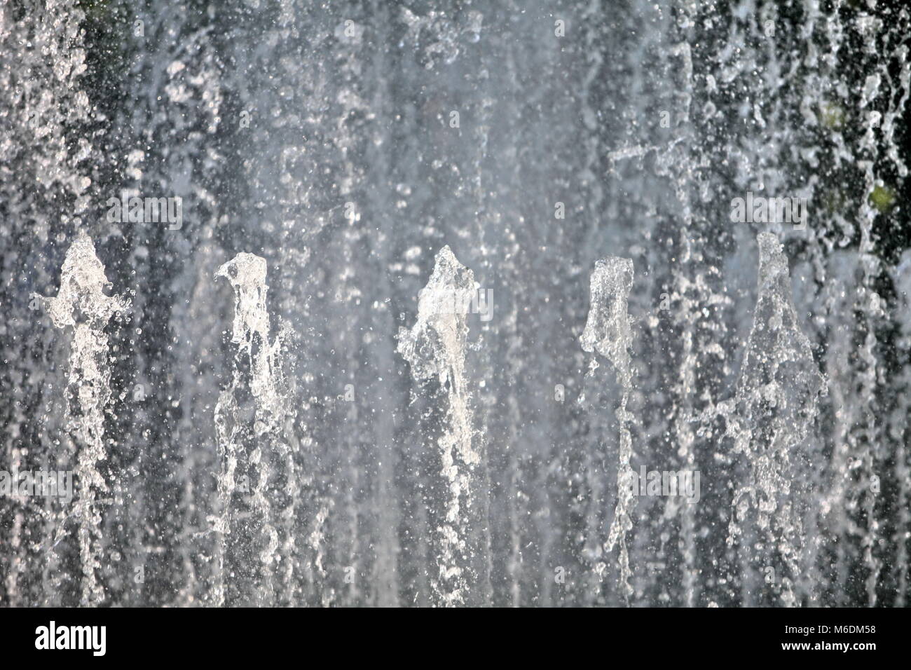 Water wall fountains from spouting vertical background, close-up Stock ...