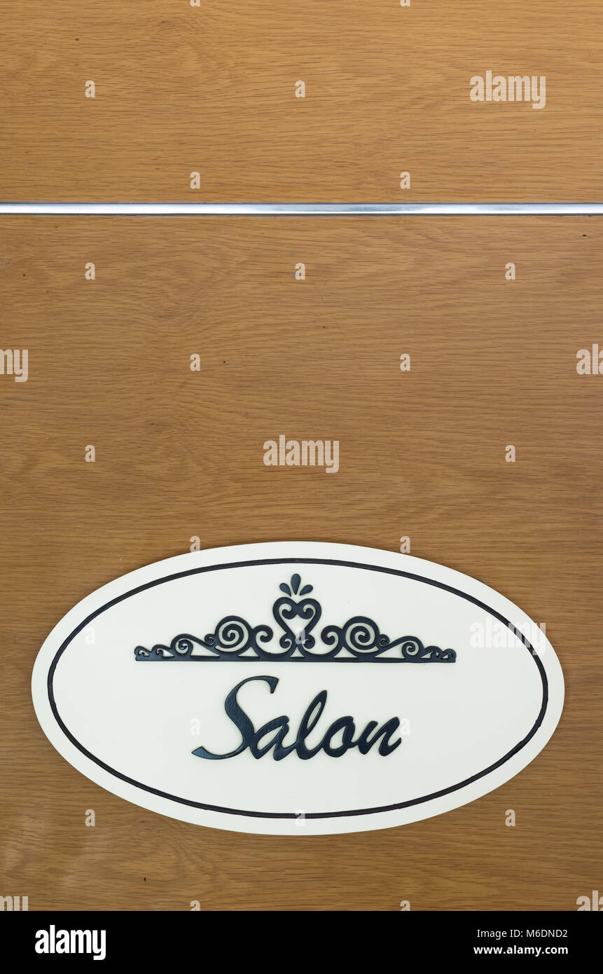 salon sign billboard on wooden wall Stock Photo - Alamy