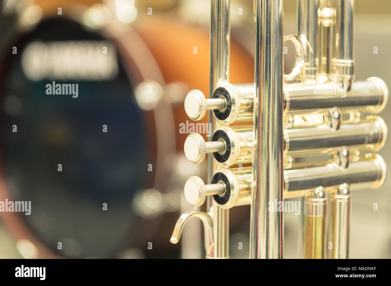 Trumpet on drum background Stock Photo - Alamy