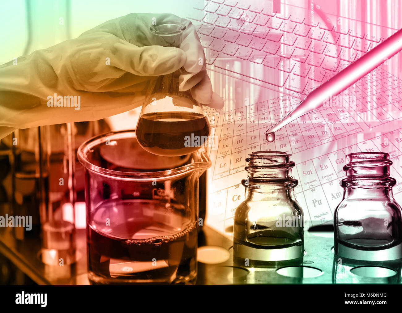 Chemical Laboratory,scientist dropping the reagent to test tube Stock ...