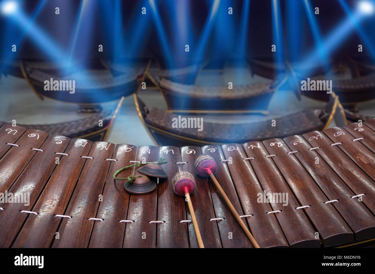 Thai musical instrument (Alto xylophone) with note in thai character on ...