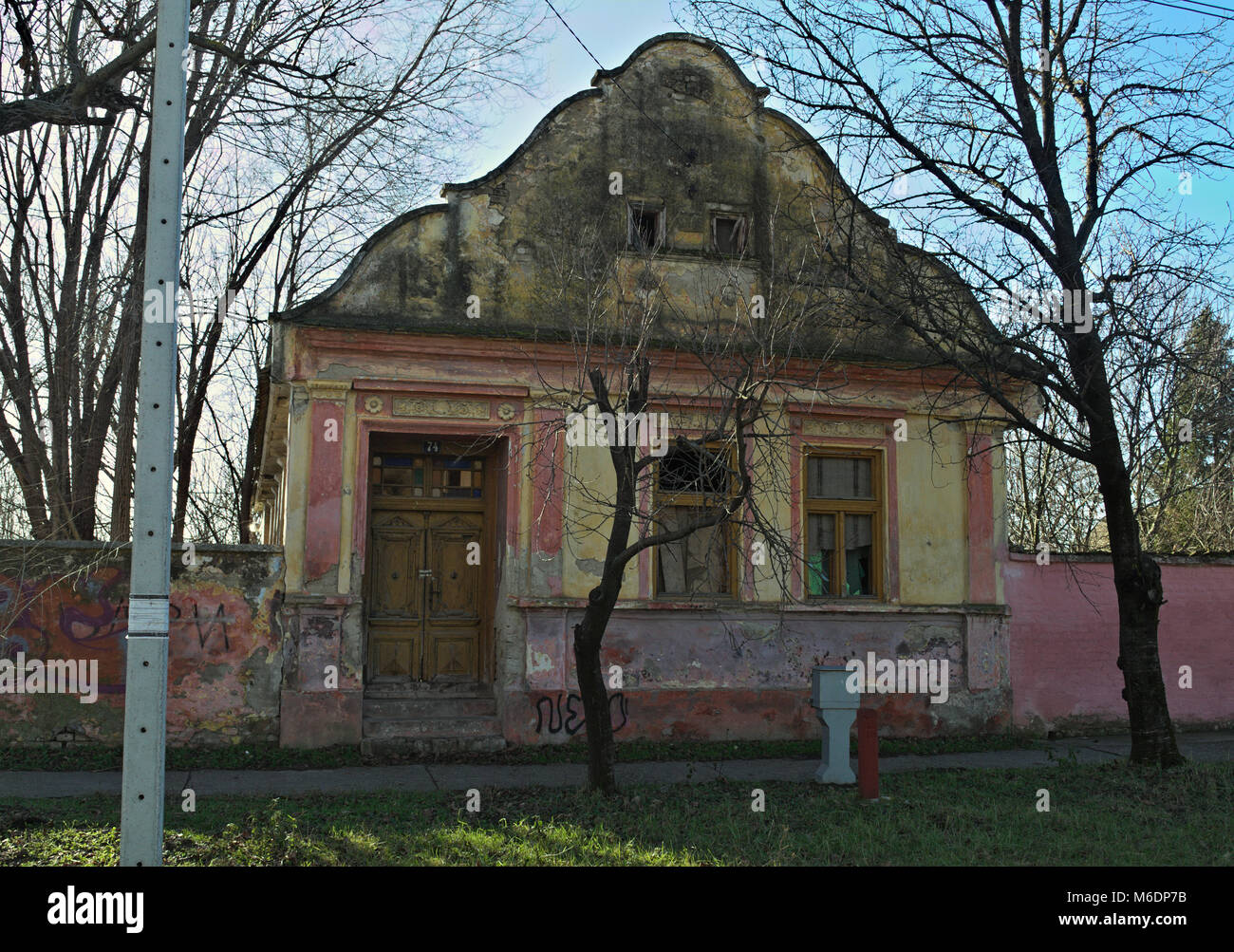 Old abandoned rustic house in state of decay from front Stock Photo - Alamy