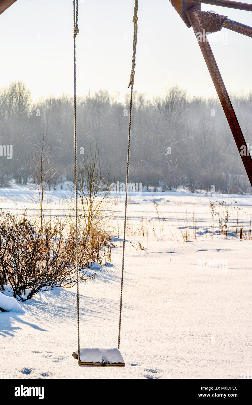 A rope swing on a power line support Stock Photo - Alamy
