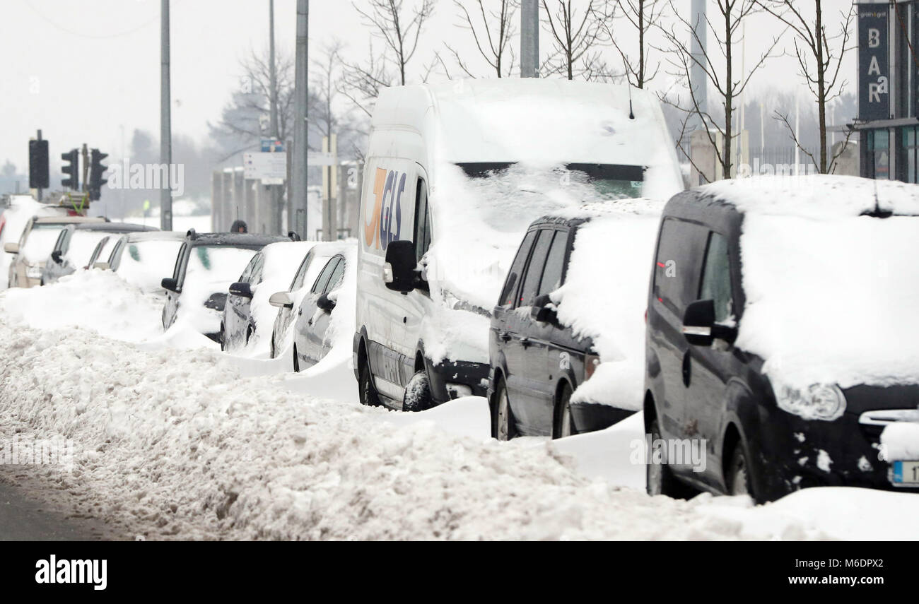 Cars abandoned in snow on the N81 in Dublin as a status orange weather ...