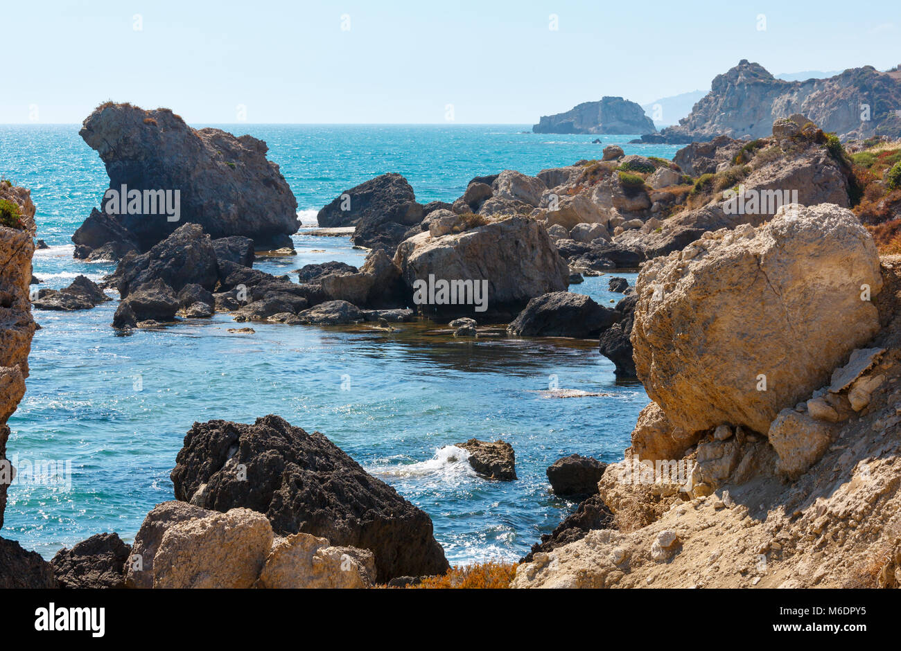 Rock in sea near beach Cala Paradiso near Rocca di San Nicola ...