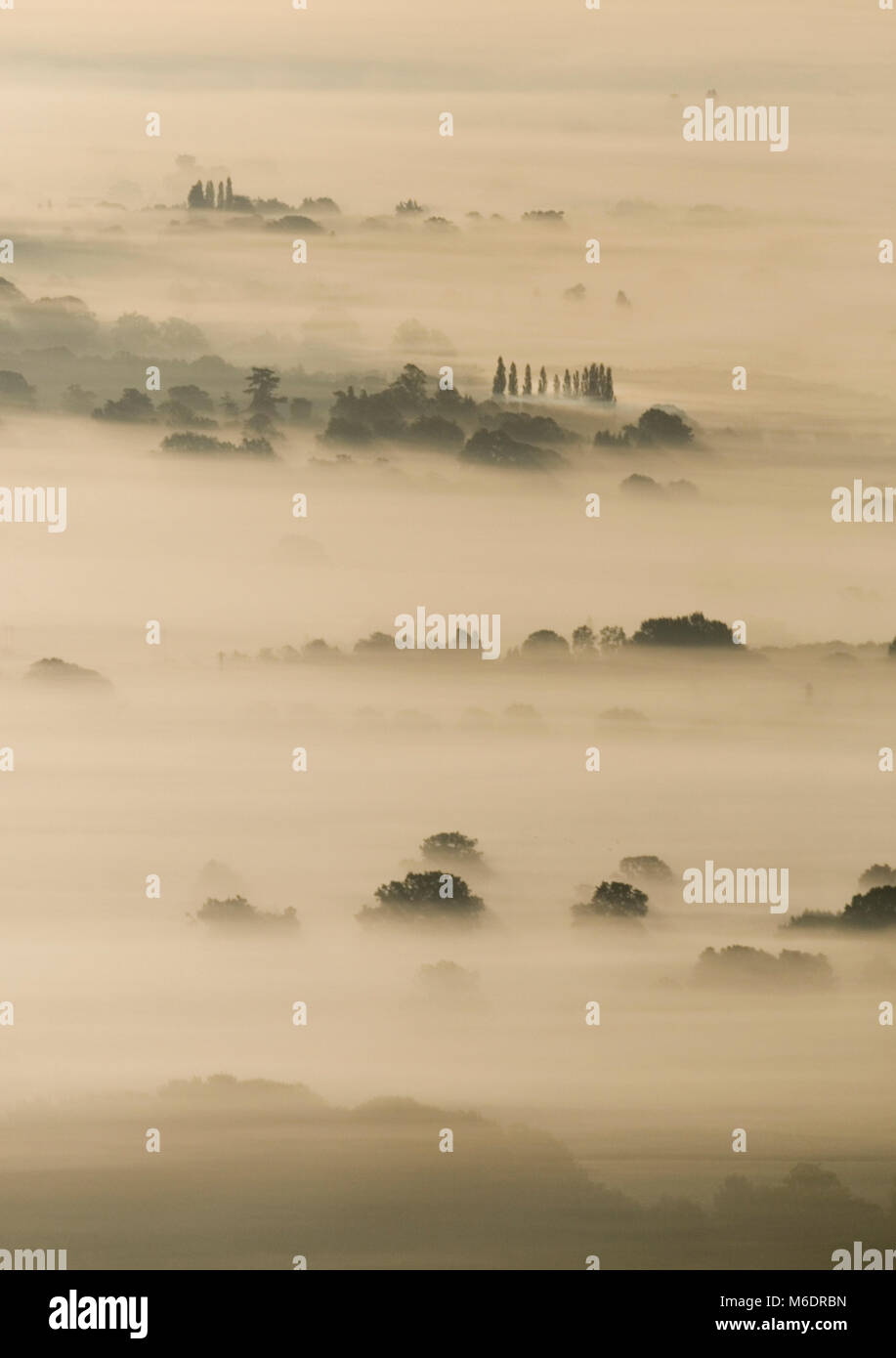 Early morning mist rolling across English countryside, Great Malvern ...
