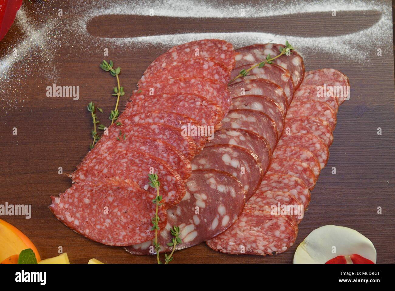 Three types of smoked sausages, Salami slices Stock Photo - Alamy