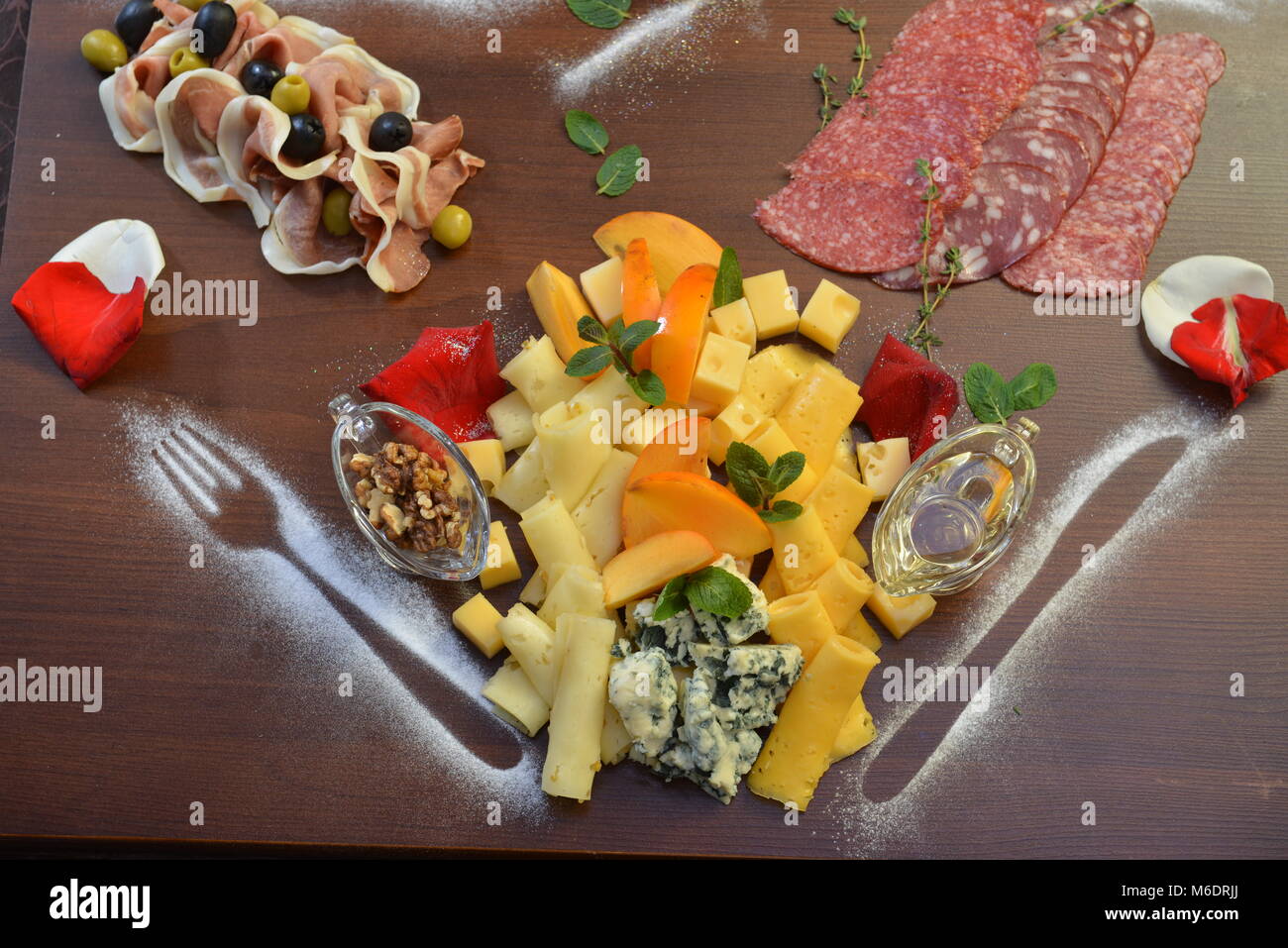 Assorted sliced cheese with mildew, blue, brie, swiss , cheddar ...