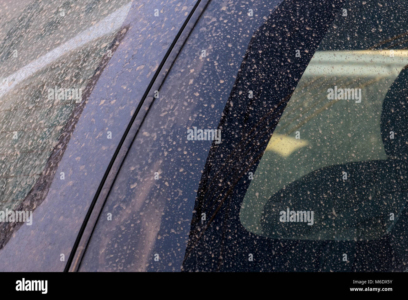 Dirty rain drops on Vehicle's rear and side windshield Stock Photo - Alamy