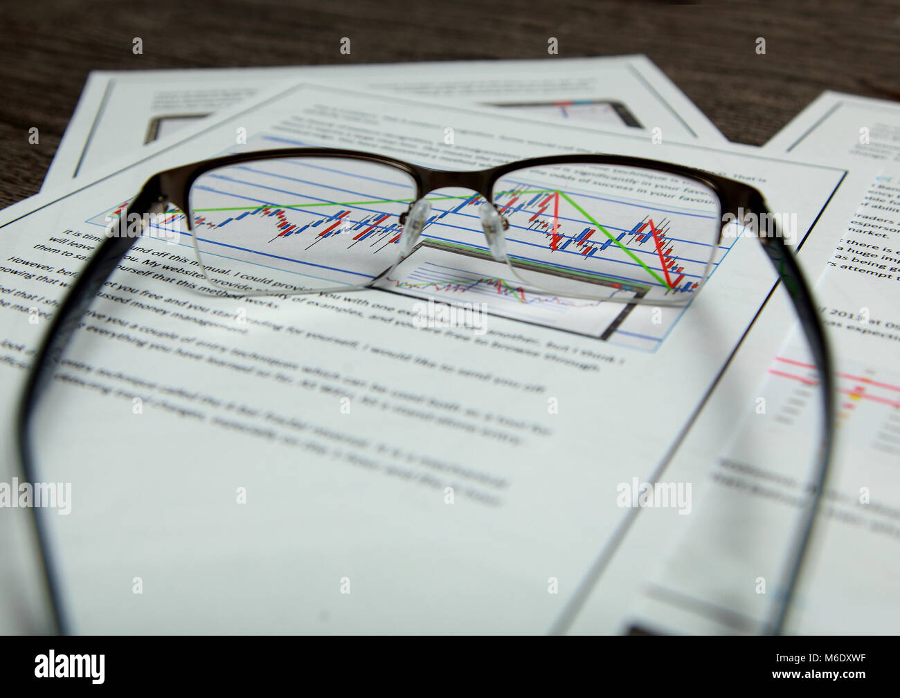 Through the close-up glasses you can see the chart on the financial ...
